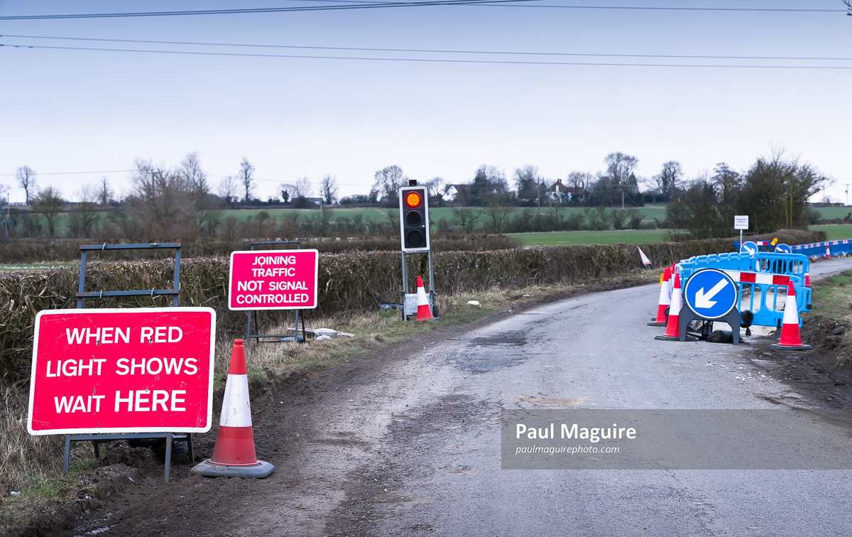 Buy a photo - Red light traffic light on rural country road UK ...