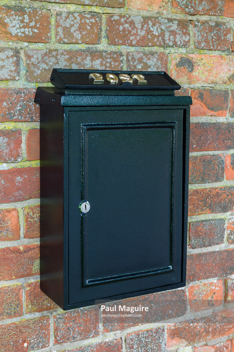 Stock photo - Vintage letterbox on brick wall, UK - Paul Maguire